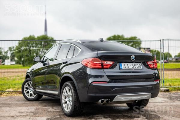 Black BMW X4 2016 in Riga, with an engine capacity of 3.00 L and mileage of 291 thousand km for 18990 €, photo 6 on AUTOMOTO.COM.LV