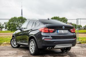 Black BMW X4 2016 in Riga, with an engine capacity of 3.00 L and mileage of 291 thousand km for 18990 €, photo 6 on AUTOMOTO.COM.LV