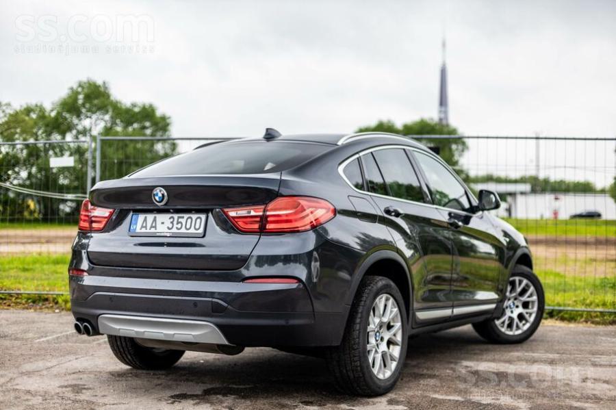 Black BMW X4 2016 in Riga, with an engine capacity of 3.00 L and mileage of 291 thousand km for 18990 €, photo 7 on AUTOMOTO.COM.LV