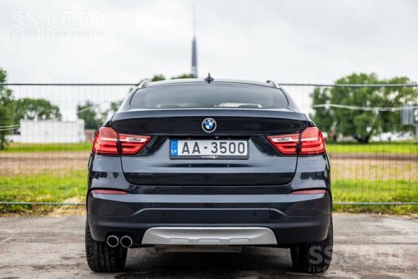 Black BMW X4 2016 in Riga, with an engine capacity of 3.00 L and mileage of 291 thousand km for 18990 €, photo 8 on AUTOMOTO.COM.LV