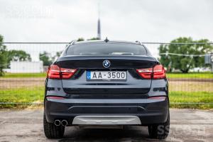 Black BMW X4 2016 in Riga, with an engine capacity of 3.00 L and mileage of 291 thousand km for 18990 €, photo 8 on AUTOMOTO.COM.LV