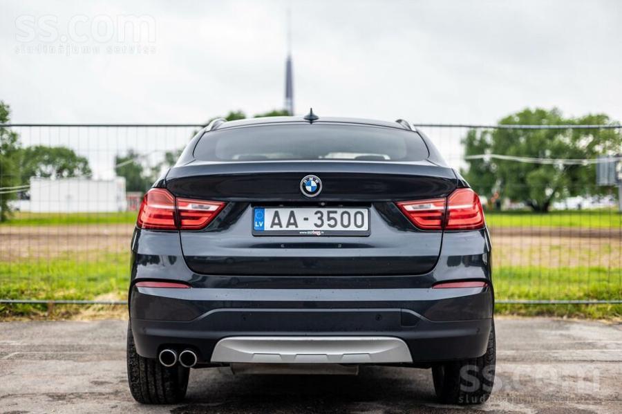 Black BMW X4 2016 in Riga, with an engine capacity of 3.00 L and mileage of 291 thousand km for 18990 €, photo 8 on AUTOMOTO.COM.LV