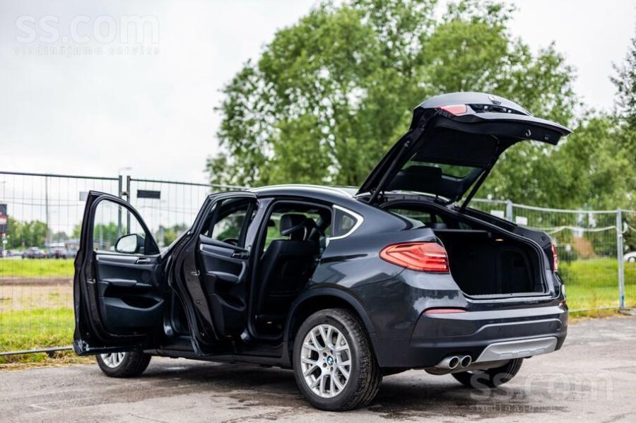 Black BMW X4 2016 in Riga, with an engine capacity of 3.00 L and mileage of 291 thousand km for 18990 €, photo 9 on AUTOMOTO.COM.LV