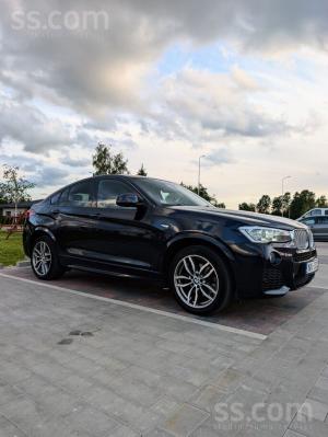 Black BMW X4 2016 in Riga, with an engine capacity of 3.00 L and mileage of 201 thousand km for 18490 €, photo 5 on AUTOMOTO.COM.LV