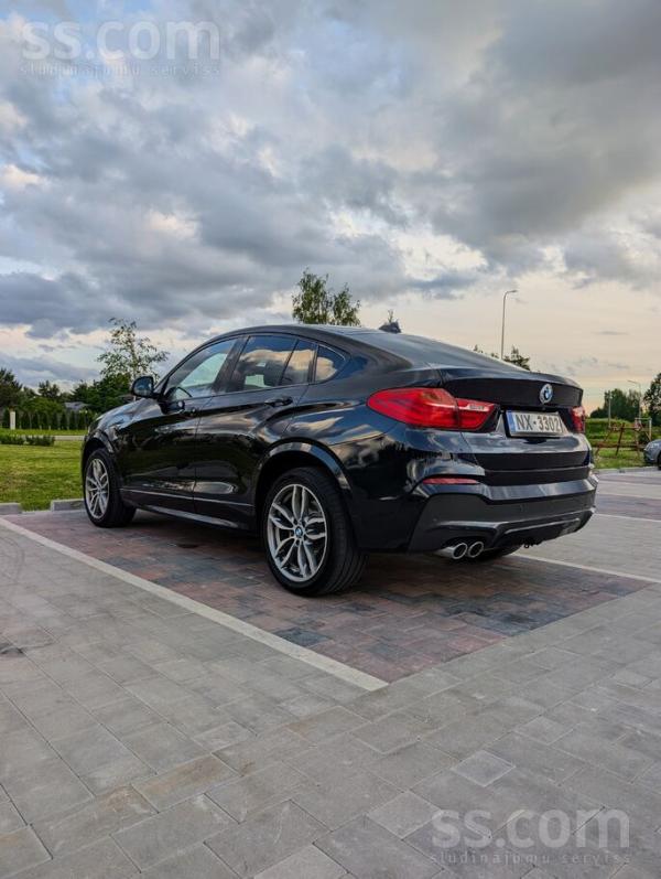 Black BMW X4 2016 in Riga, with an engine capacity of 3.00 L and mileage of 201 thousand km for 18490 €, photo 6 on AUTOMOTO.COM.LV