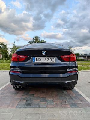 Black BMW X4 2016 in Riga, with an engine capacity of 3.00 L and mileage of 201 thousand km for 18490 €, photo 7 on AUTOMOTO.COM.LV