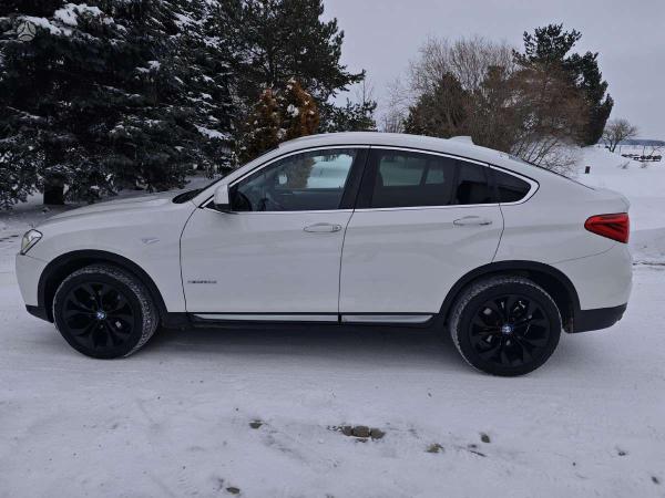 Black BMW X4 2016 in Siauliai, with an engine capacity of 2.00 L and mileage of 290 thousand km for 15150 €, photo 1 on AUTOMOTO.COM.LV