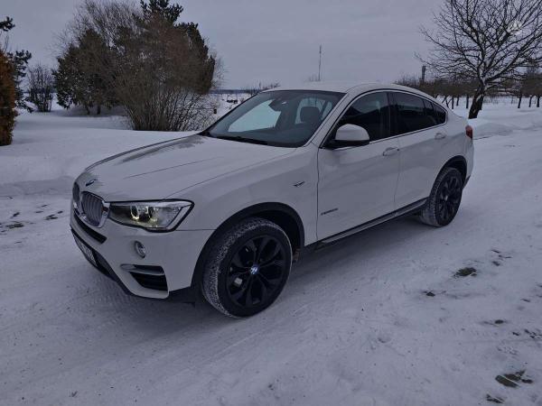 Black BMW X4 2016 in Siauliai, with an engine capacity of 2.00 L and mileage of 290 thousand km for 15150 €, photo 2 on AUTOMOTO.COM.LV