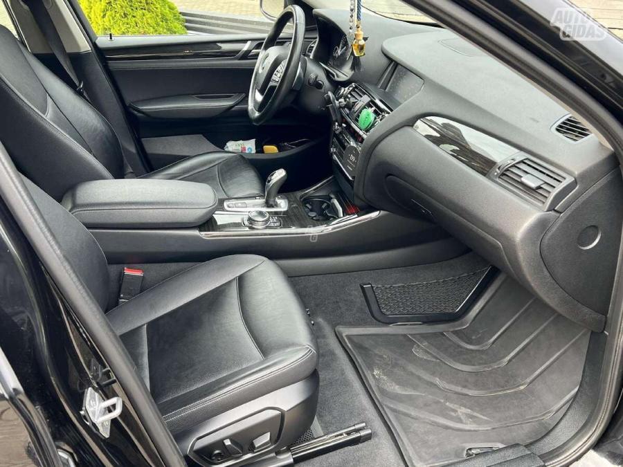 Black BMW X4 2016 in Kedainiai, with an engine capacity of 2.00 L and mileage of 111 thousand km for 19900 €, photo 17 on AUTOMOTO.COM.LV