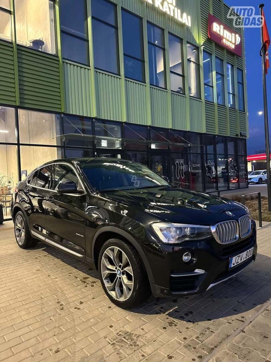 Black BMW X4 2016 in Vilnius, with an engine capacity of 2.00 L and mileage of 155 thousand km for 16500 €, photo 1 on AUTOMOTO.COM.LV
