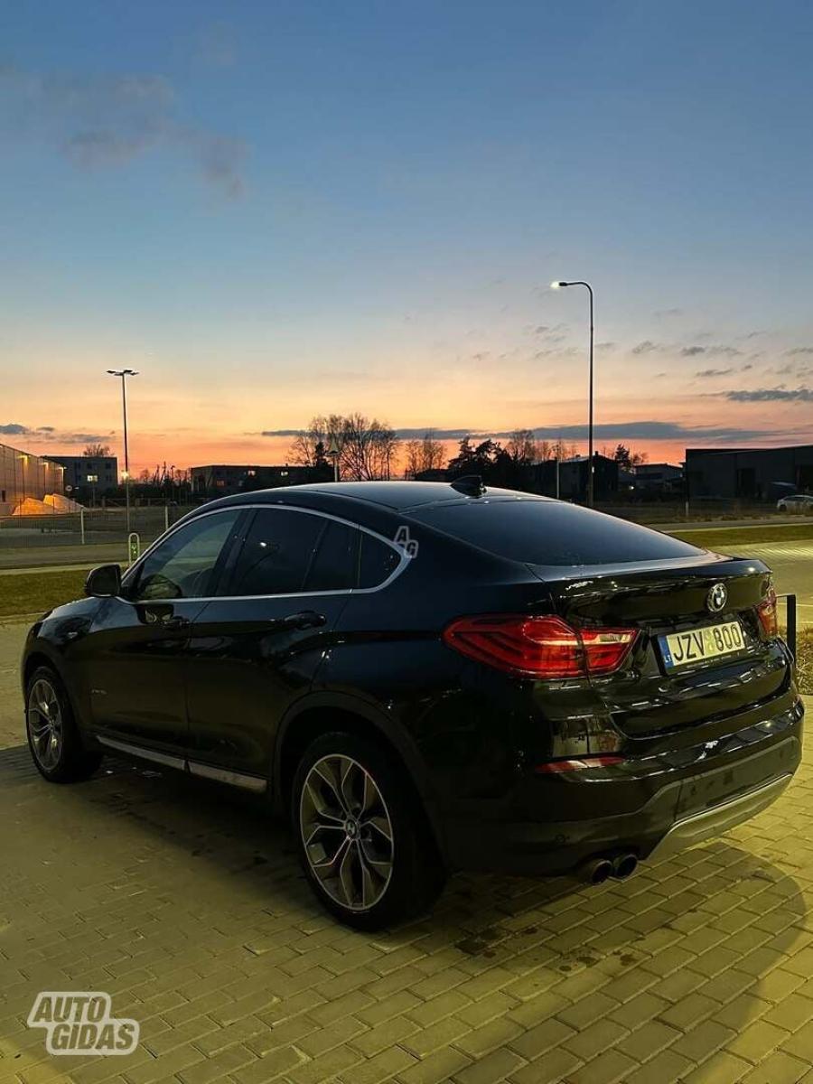 Black BMW X4 2016 in Vilnius, with an engine capacity of 2.00 L and mileage of 155 thousand km for 16500 €, photo 7 on AUTOMOTO.COM.LV