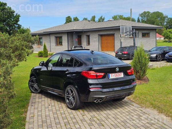 Black BMW X4 2016 in Riga, with an engine capacity of 3.00 L and mileage of 196 thousand km for 15777 €, photo 3 on AUTOMOTO.COM.LV