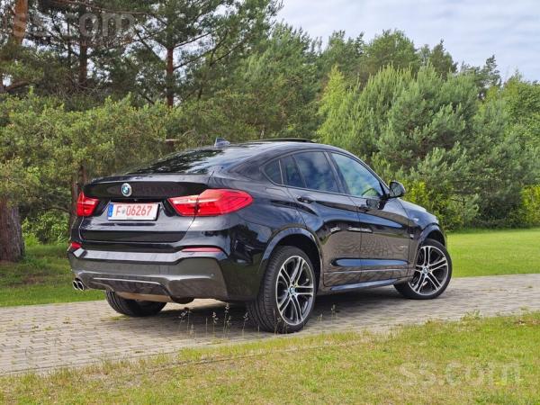 Black BMW X4 2016 in Riga, with an engine capacity of 3.00 L and mileage of 196 thousand km for 15777 €, photo 9 on AUTOMOTO.COM.LV