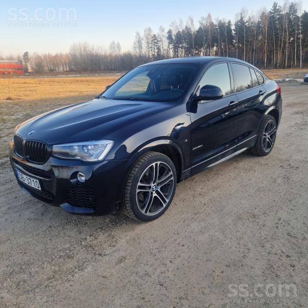 Black BMW X4 2016 in Riga, with an engine capacity of 2.00 L and mileage of 213 thousand km for 18500 €, photo 1 on AUTOMOTO.COM.LV