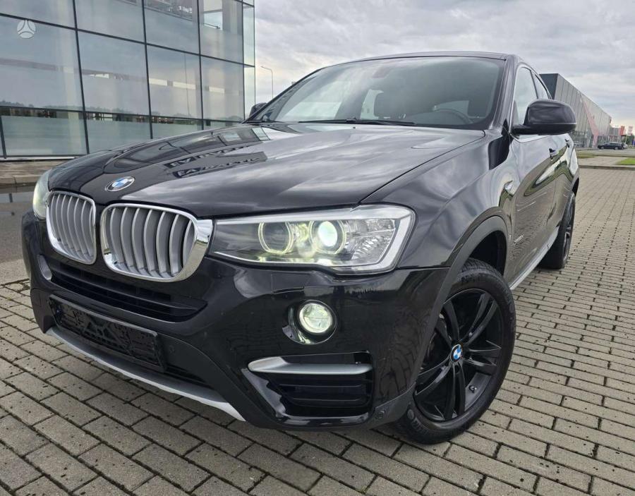Black BMW X4 2016 in Panevezys, with an engine capacity of 2.00 L and mileage of 279 thousand km for 13499 €, photo 1 on AUTOMOTO.COM.LV
