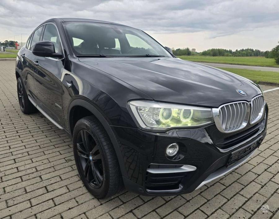 Black BMW X4 2016 in Panevezys, with an engine capacity of 2.00 L and mileage of 279 thousand km for 13499 €, photo 8 on AUTOMOTO.COM.LV