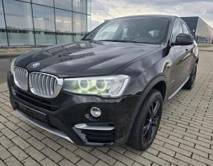 Black BMW X4 2016 in Panevezys, with an engine capacity of 2.00 L and mileage of 279 thousand km for 13499 €, photo 10 on AUTOMOTO.COM.LV