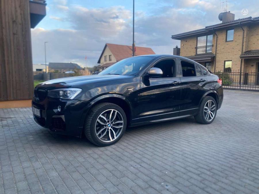 Black BMW X4 2016 in Vilnius, with an engine capacity of 3.00 L and mileage of 195 thousand km for 21450 €, photo 1 on AUTOMOTO.COM.LV