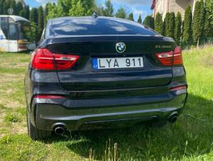 Black BMW X4 2016 in Vilnius, with an engine capacity of 3.00 L and mileage of 195 thousand km for 21450 €, photo 7 on AUTOMOTO.COM.LV