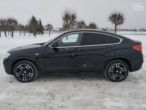Black BMW X4 2017 in Kaunas, with an engine capacity of 2.00 L and mileage of 277 thousand km for 15700 €, photo 5 on AUTOMOTO.COM.LV