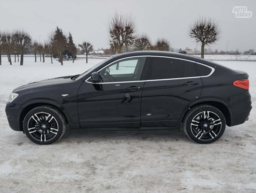 Black BMW X4 2017 in Kaunas, with an engine capacity of 2.00 L and mileage of 277 thousand km for 15700 €, photo 5 on AUTOMOTO.COM.LV