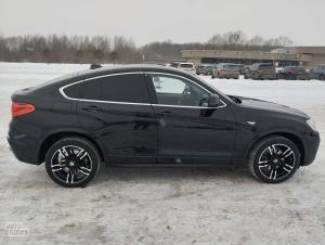 Black BMW X4 2017 in Kaunas, with an engine capacity of 2.00 L and mileage of 277 thousand km for 15700 €, photo 7 on AUTOMOTO.COM.LV