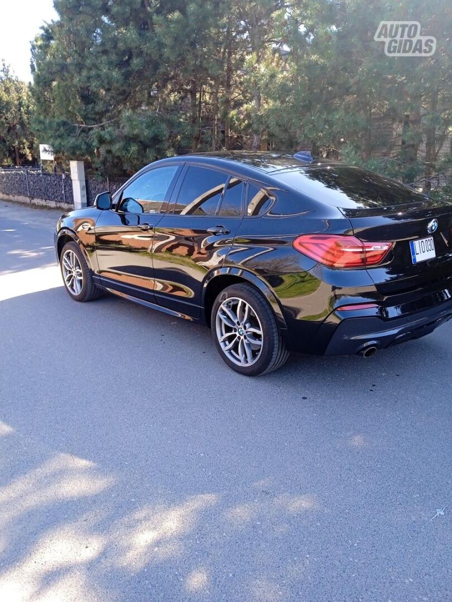 Black BMW X4 2017 in Kaunas, with an engine capacity of 3.00 L and mileage of 79 thousand km for 24500 €, photo 6 on AUTOMOTO.COM.LV