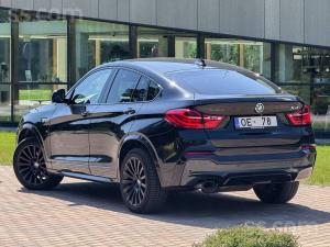 Black BMW X4 2017 in Riga, with an engine capacity of 2.00 L and mileage of 278 thousand km for 18900 €, photo 5 on AUTOMOTO.COM.LV