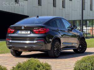 Black BMW X4 2017 in Riga, with an engine capacity of 2.00 L and mileage of 278 thousand km for 18900 €, photo 6 on AUTOMOTO.COM.LV