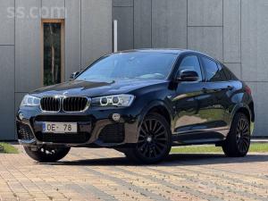 Black BMW X4 2017 in Riga, with an engine capacity of 2.00 L and mileage of 278 thousand km for 18900 €, photo 7 on AUTOMOTO.COM.LV