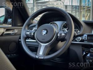 Black BMW X4 2017 in Riga, with an engine capacity of 2.00 L and mileage of 278 thousand km for 18900 €, photo 8 on AUTOMOTO.COM.LV