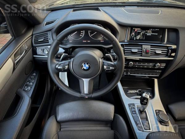 Black BMW X4 2017 in Riga, with an engine capacity of 2.00 L and mileage of 278 thousand km for 18900 €, photo 8 on AUTOMOTO.COM.LV