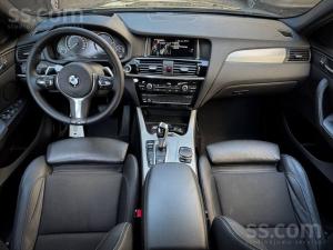 Black BMW X4 2017 in Riga, with an engine capacity of 2.00 L and mileage of 278 thousand km for 18900 €, photo 11 on AUTOMOTO.COM.LV