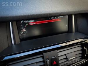 Black BMW X4 2017 in Riga, with an engine capacity of 2.00 L and mileage of 278 thousand km for 18900 €, photo 17 on AUTOMOTO.COM.LV