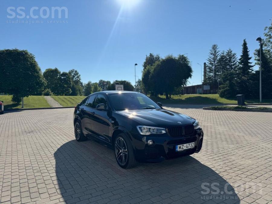 Black BMW X4 2017 in Dobele, with an engine capacity of 3.00 L and mileage of 203 thousand km for 22000 €, photo 4 on AUTOMOTO.COM.LV