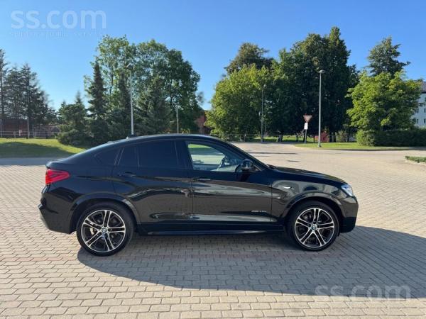 Black BMW X4 2017 in Dobele, with an engine capacity of 3.00 L and mileage of 203 thousand km for 22000 €, photo 5 on AUTOMOTO.COM.LV