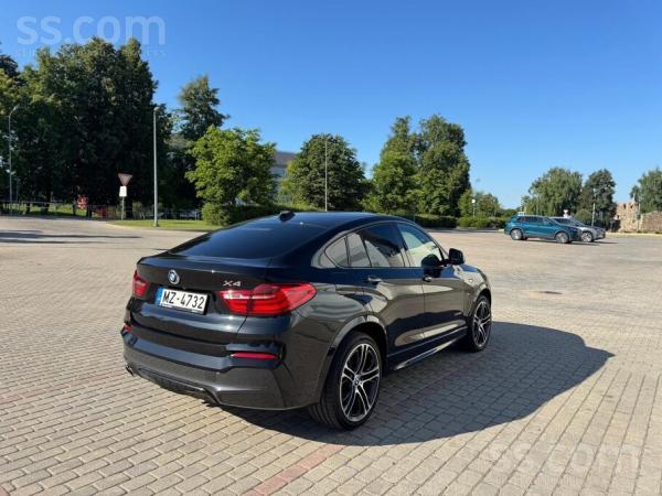 Black BMW X4 2017 in Dobele, with an engine capacity of 3.00 L and mileage of 203 thousand km for 22000 €, photo 6 on AUTOMOTO.COM.LV
