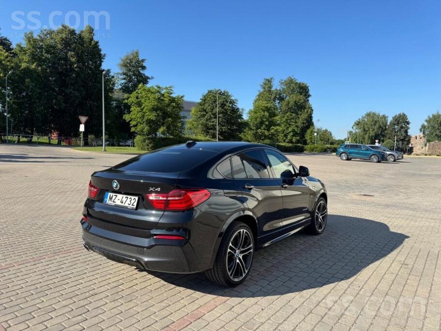 Black BMW X4 2017 in Dobele, with an engine capacity of 3.00 L and mileage of 203 thousand km for 22000 €, photo 6 on AUTOMOTO.COM.LV