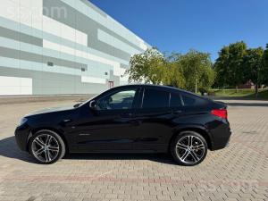 Black BMW X4 2017 in Dobele, with an engine capacity of 3.00 L and mileage of 203 thousand km for 22000 €, photo 9 on AUTOMOTO.COM.LV