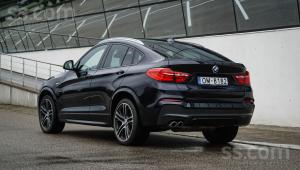 Black BMW X4 2017 in Riga, with an engine capacity of 3.00 L and mileage of 220 thousand km for 18450 €, photo 4 on AUTOMOTO.COM.LV