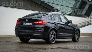 Black BMW X4 2017 in Riga, with an engine capacity of 3.00 L and mileage of 220 thousand km for 18450 €, photo 5 on AUTOMOTO.COM.LV