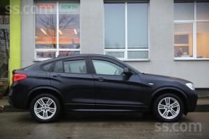 Black BMW X4 2018 in Riga, with an engine capacity of 2.00 L and mileage of 206 thousand km for 22995 €, photo 3 on AUTOMOTO.COM.LV