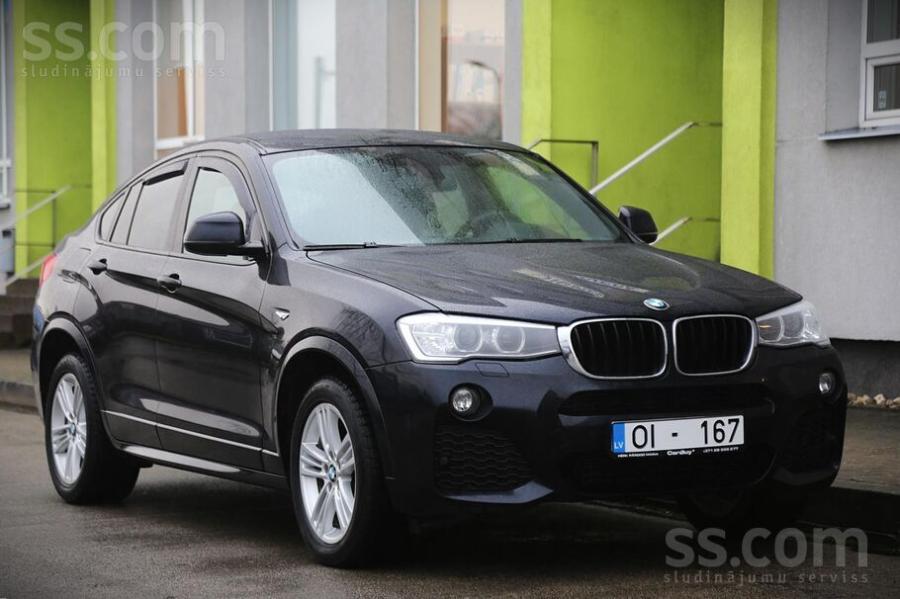 Black BMW X4 2018 in Riga, with an engine capacity of 2.00 L and mileage of 206 thousand km for 22995 €, photo 4 on AUTOMOTO.COM.LV