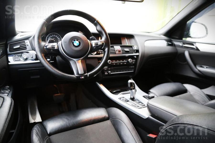 Black BMW X4 2018 in Riga, with an engine capacity of 2.00 L and mileage of 206 thousand km for 22995 €, photo 8 on AUTOMOTO.COM.LV