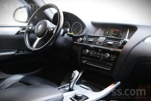 Black BMW X4 2018 in Riga, with an engine capacity of 2.00 L and mileage of 206 thousand km for 22995 €, photo 12 on AUTOMOTO.COM.LV