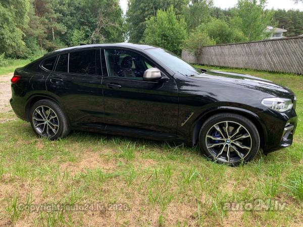 Black BMW X4 2018 in Tallinn, with an engine capacity of 3.00 L and mileage of 125 thousand km for 31900 €, photo 8 on AUTOMOTO.COM.LV