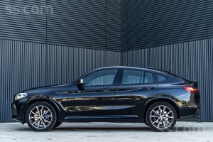 Black BMW X4 2018 in Riga, with an engine capacity of 3.00 L and mileage of 82 thousand km for 35000 €, photo 6 on AUTOMOTO.COM.LV