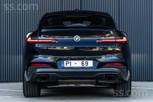 Black BMW X4 2018 in Riga, with an engine capacity of 3.00 L and mileage of 82 thousand km for 35000 €, photo 7 on AUTOMOTO.COM.LV