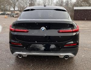 Black BMW X4 2019 in Siauliai, with an engine capacity of 2.00 L and mileage of 75 thousand km for 27700 €, photo 6 on AUTOMOTO.COM.LV
