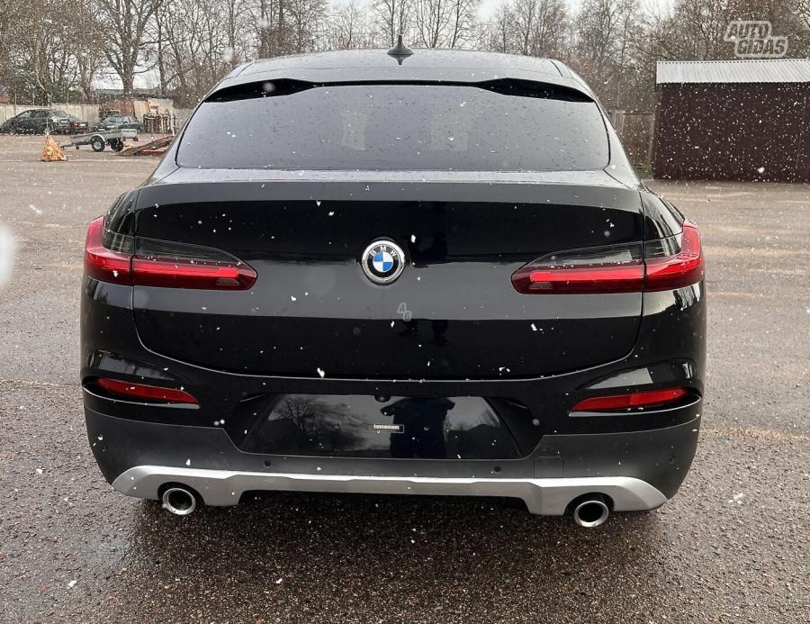 Black BMW X4 2019 in Siauliai, with an engine capacity of 2.00 L and mileage of 75 thousand km for 27700 €, photo 6 on AUTOMOTO.COM.LV